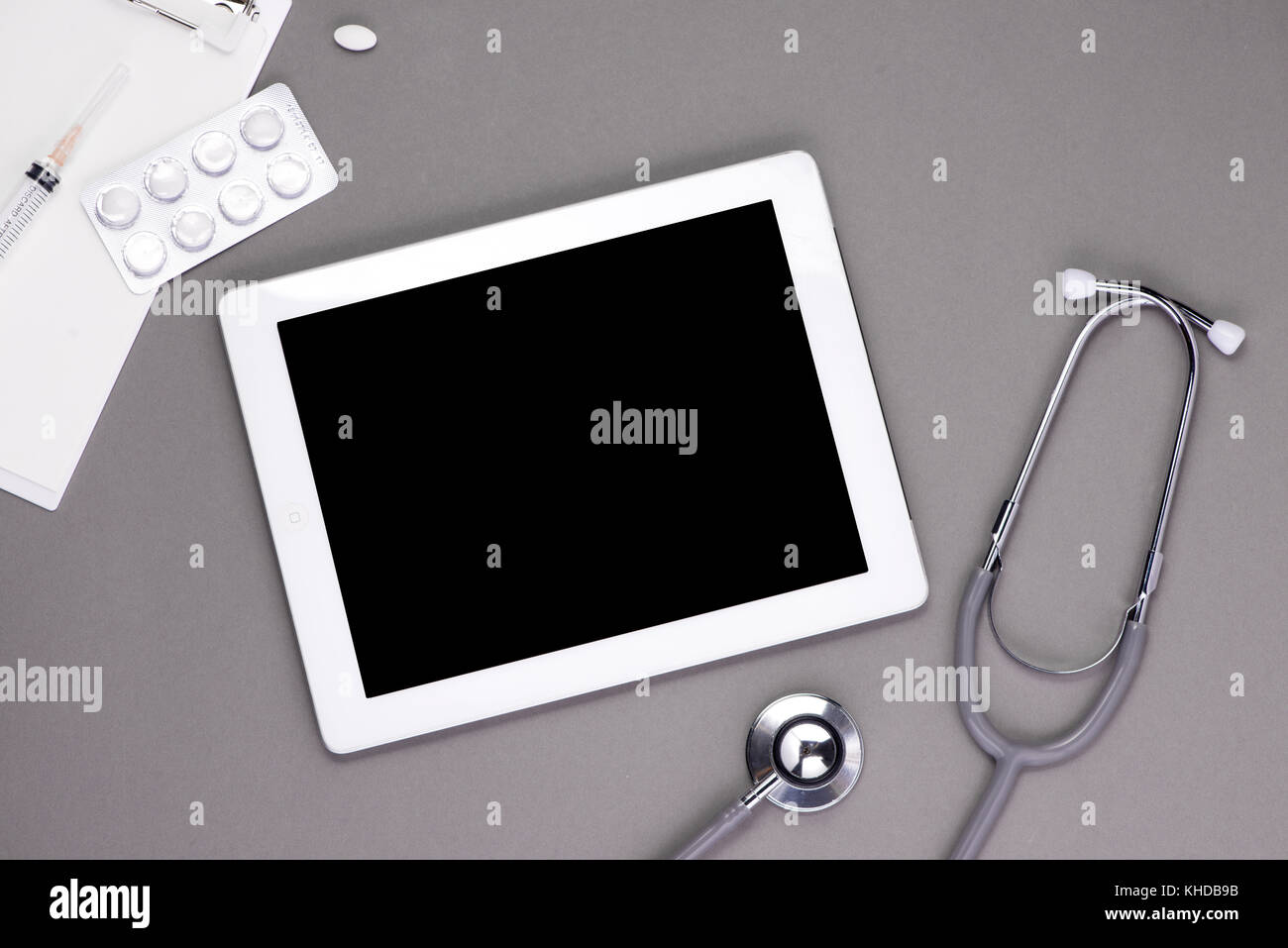 Top view of doctor desk table with stethoscope and medical items. Flat ...