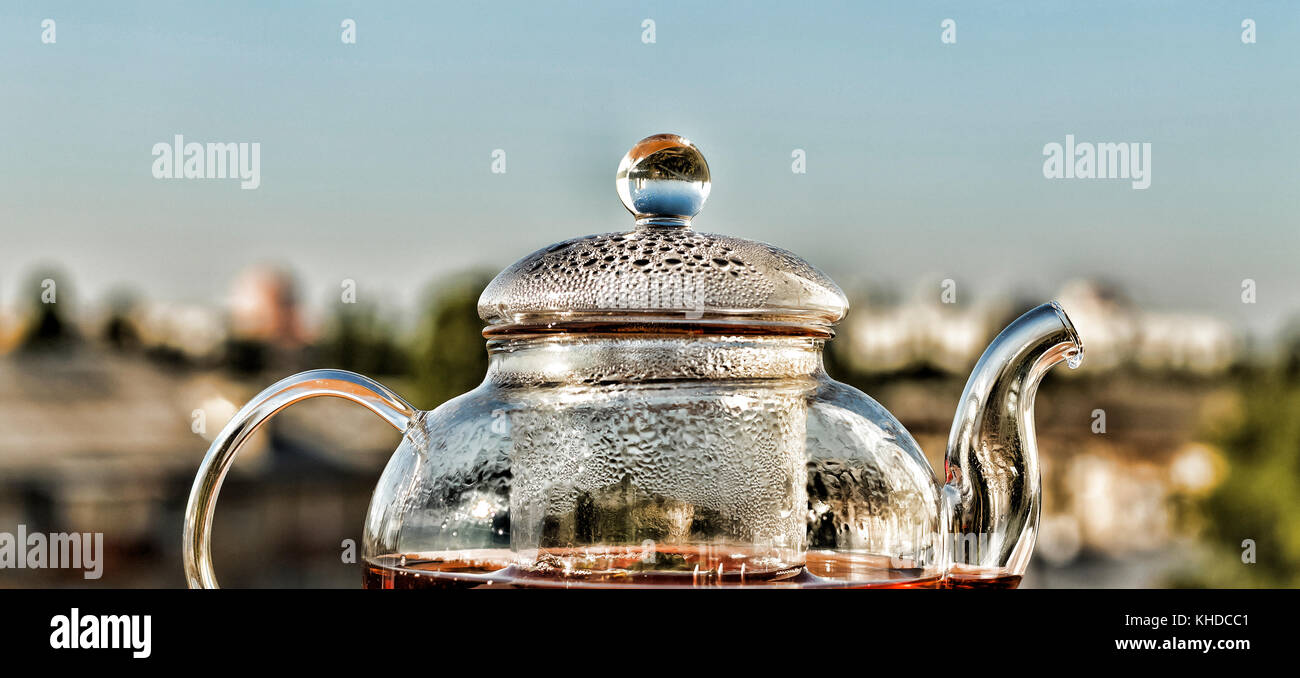 Tea. Teapot with tea. Breakfast. Tea in a glass teapot on the ...