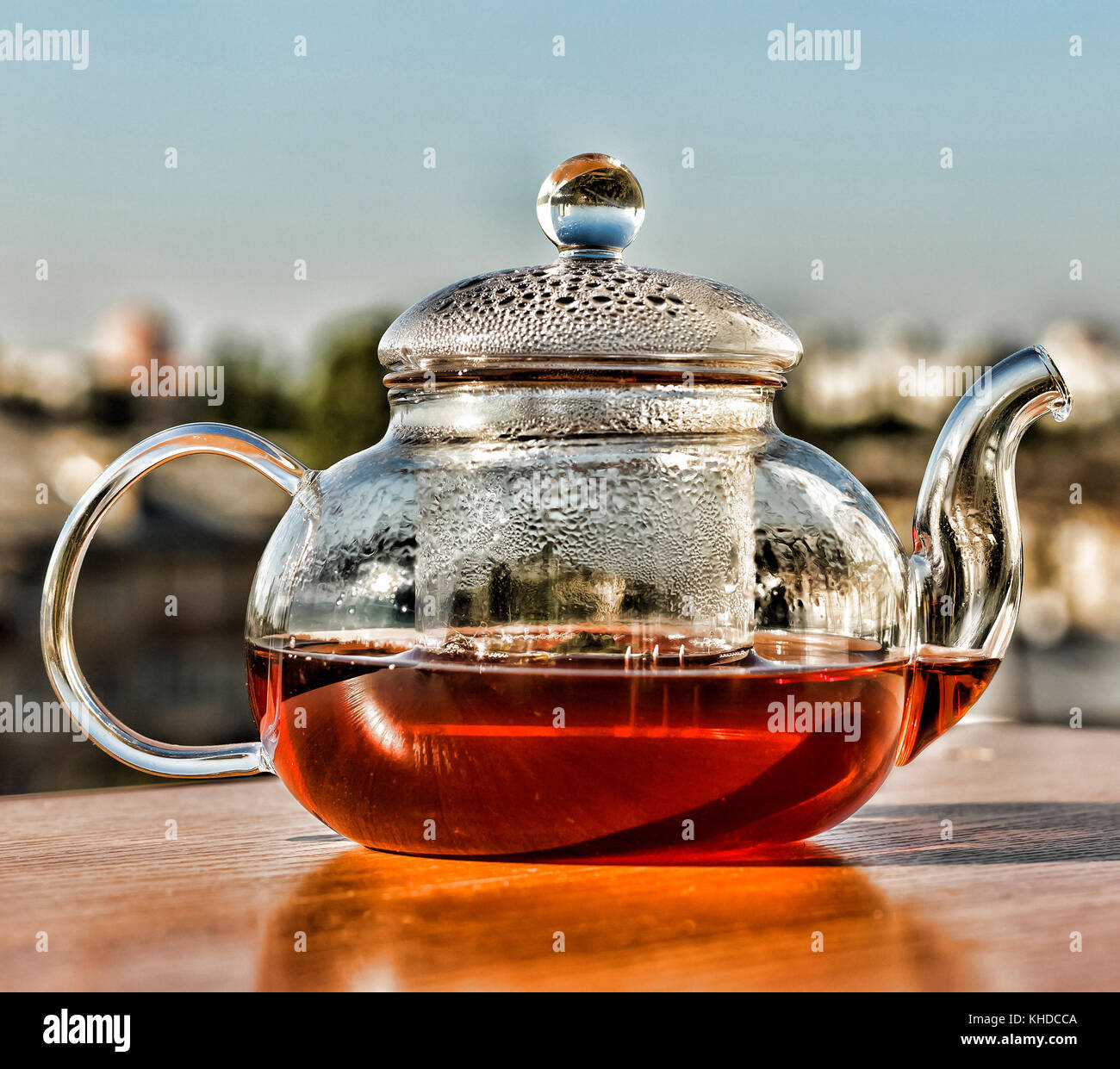 Tea. Teapot with tea. Breakfast. Tea in a glass teapot on the ...