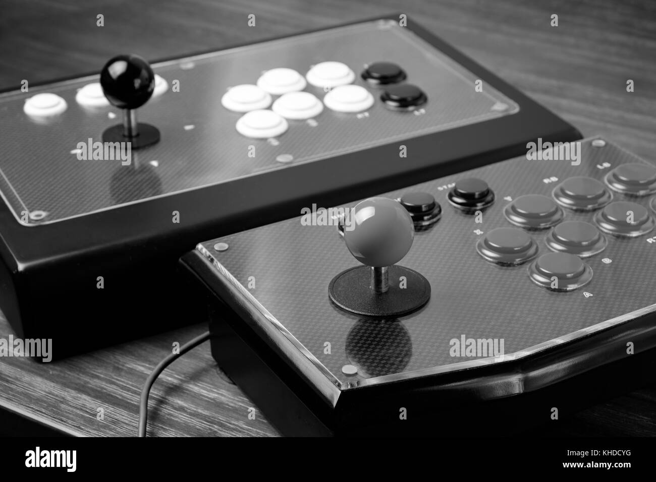 Real Arcade Joystick on Wood table (Black and white Stock Photo - Alamy