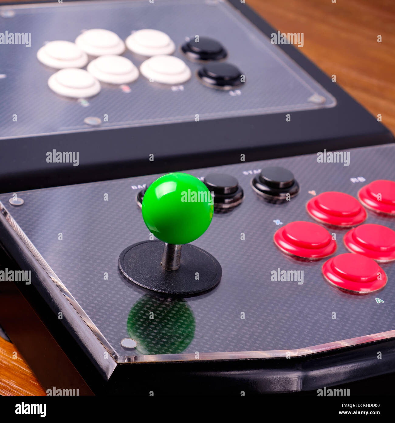 Real Arcade Joystick on Wood table Stock Photo - Alamy