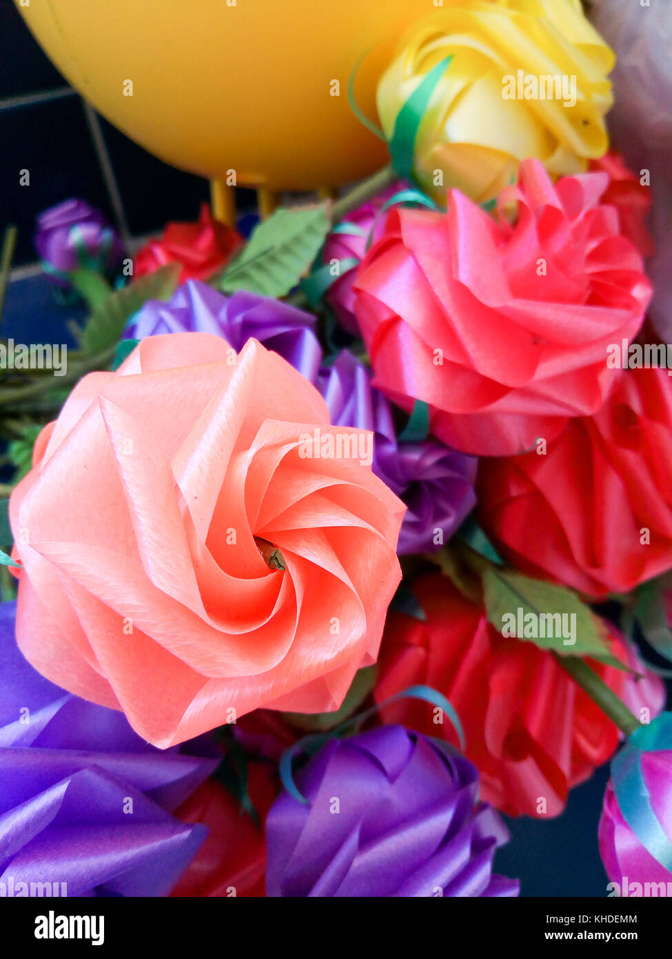 Rose fake flower and Floral backgroundrose flowers made of fabric. The ...