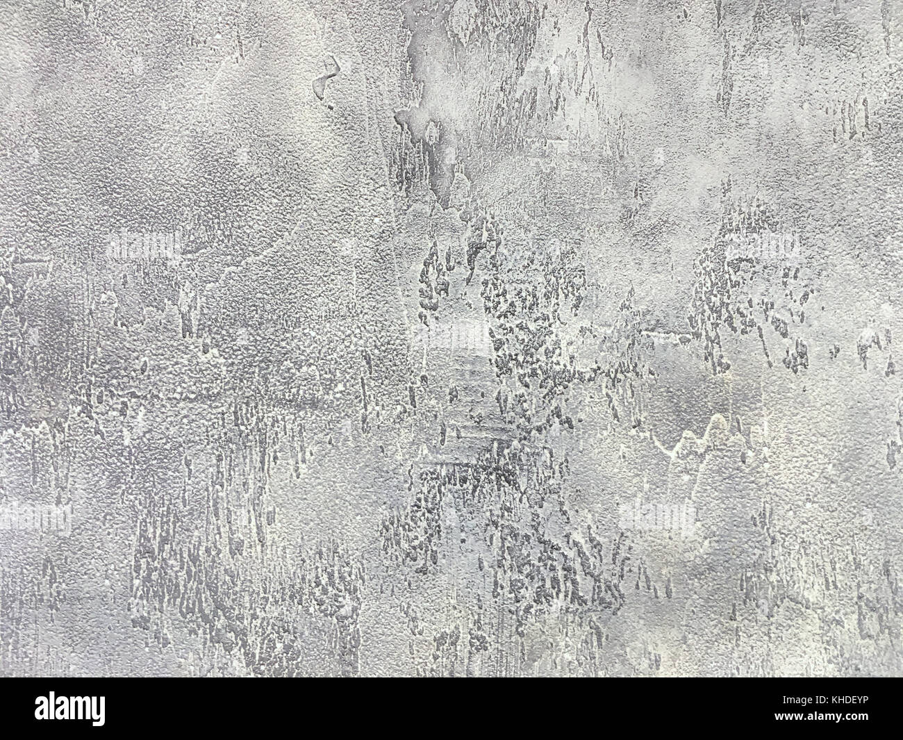 Old gray wall covered with shabby uneven plaster. Texture of vintage ...