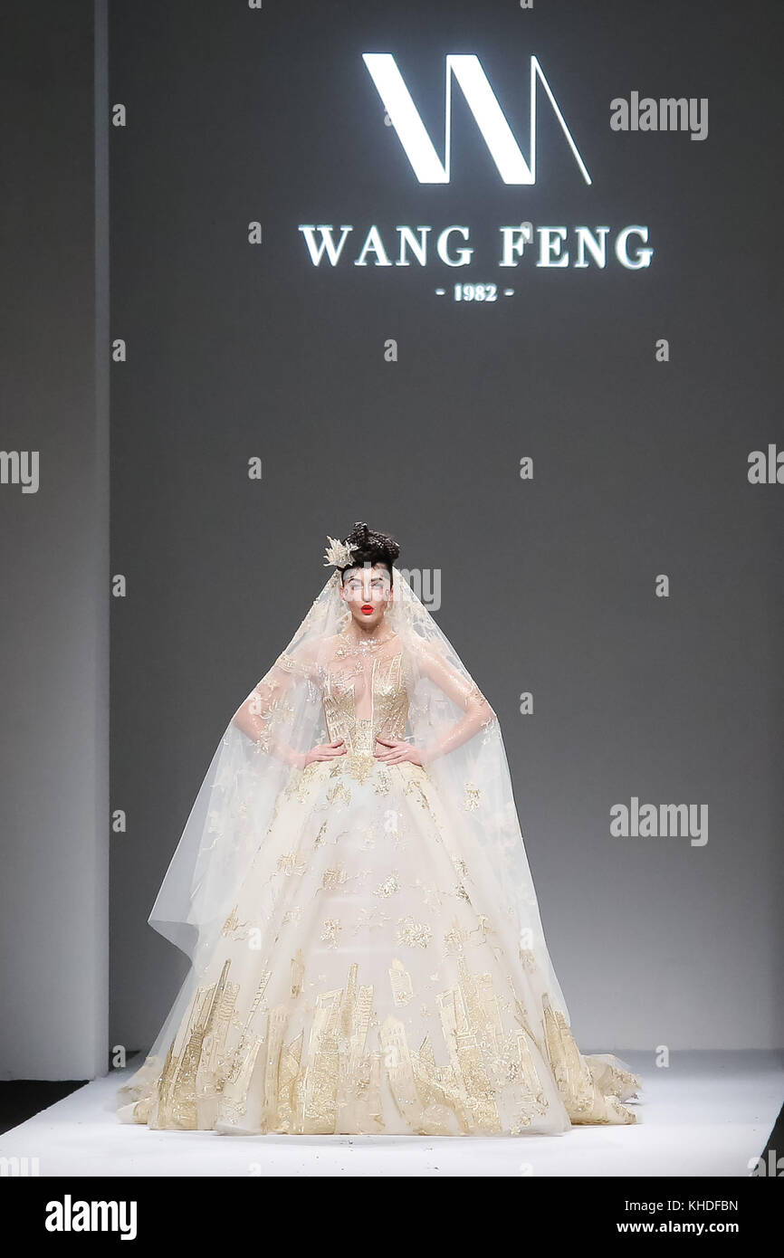 A model on the catwalk at the Wang Feng show during Shanghai Fashion ...