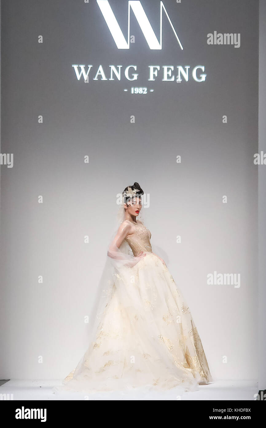 A model on the catwalk at the Wang Feng show during Shanghai Fashion ...