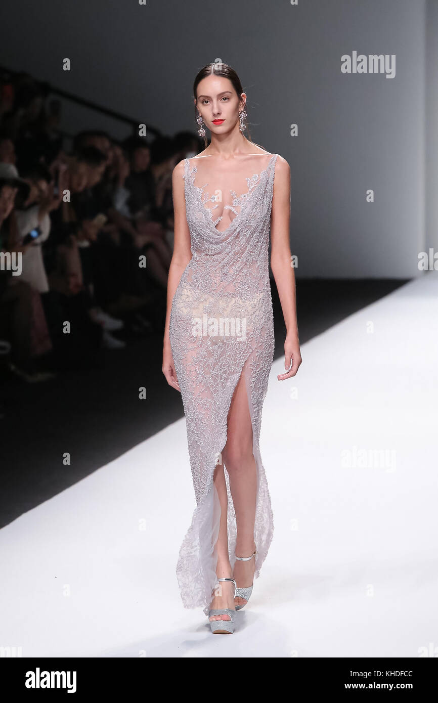 A model on the catwalk at the Wang Feng show during Shanghai Fashion ...