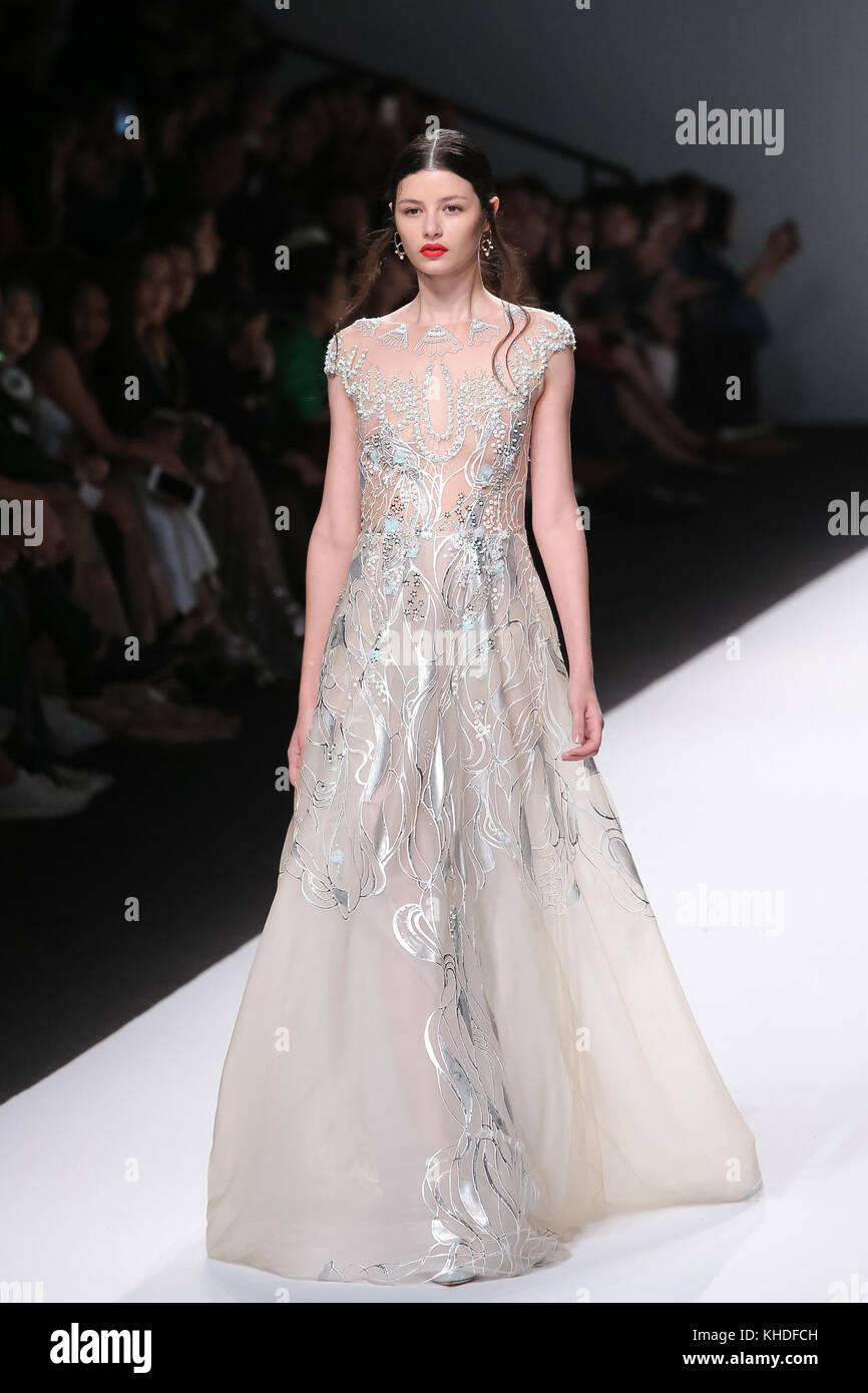 A model on the catwalk at the Wang Feng show during Shanghai Fashion ...
