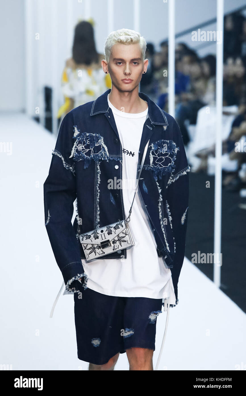 A model on the catwalk at the Y-Vision show during Shanghai Fashion ...