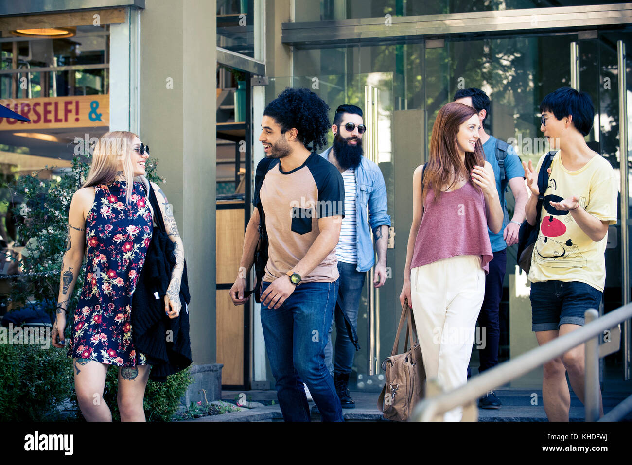 College students walking together Stock Photo - Alamy