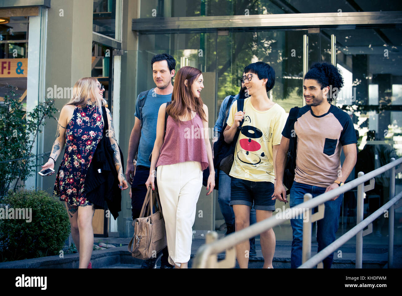 College students walking together Stock Photo - Alamy