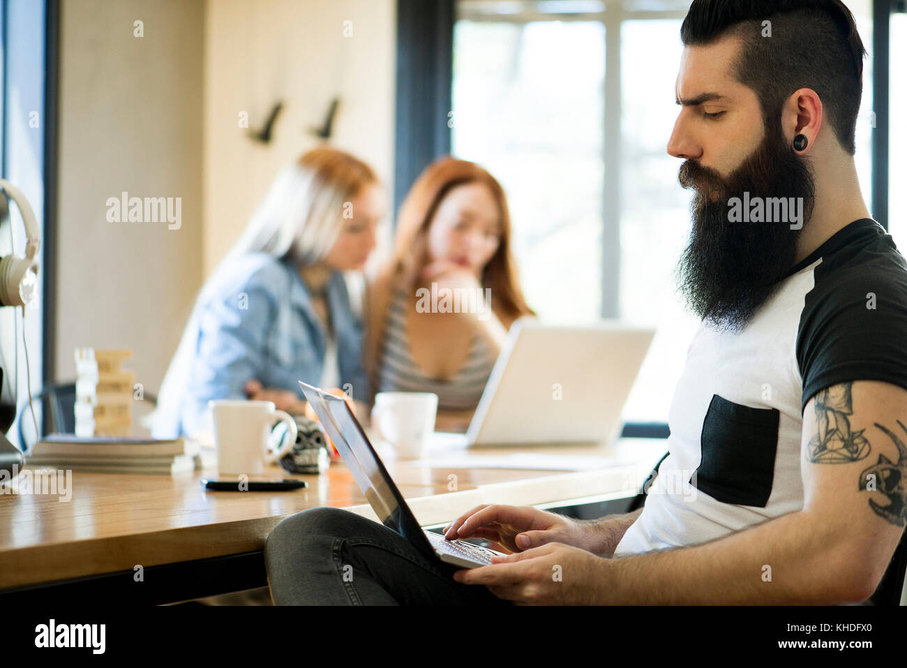 Man using laptop computer Stock Photo - Alamy