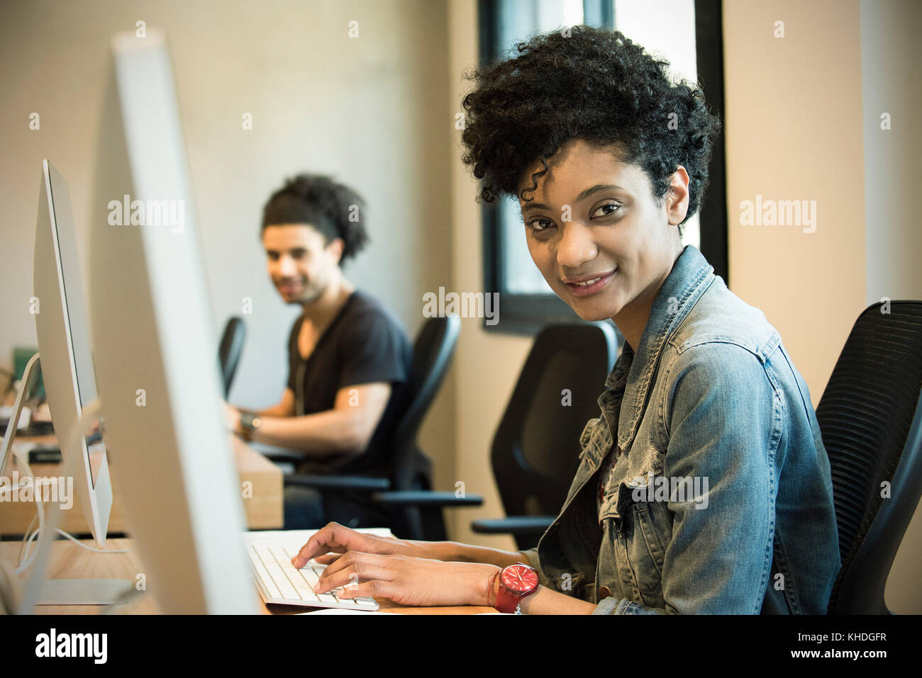 Woman working in office Stock Photo - Alamy