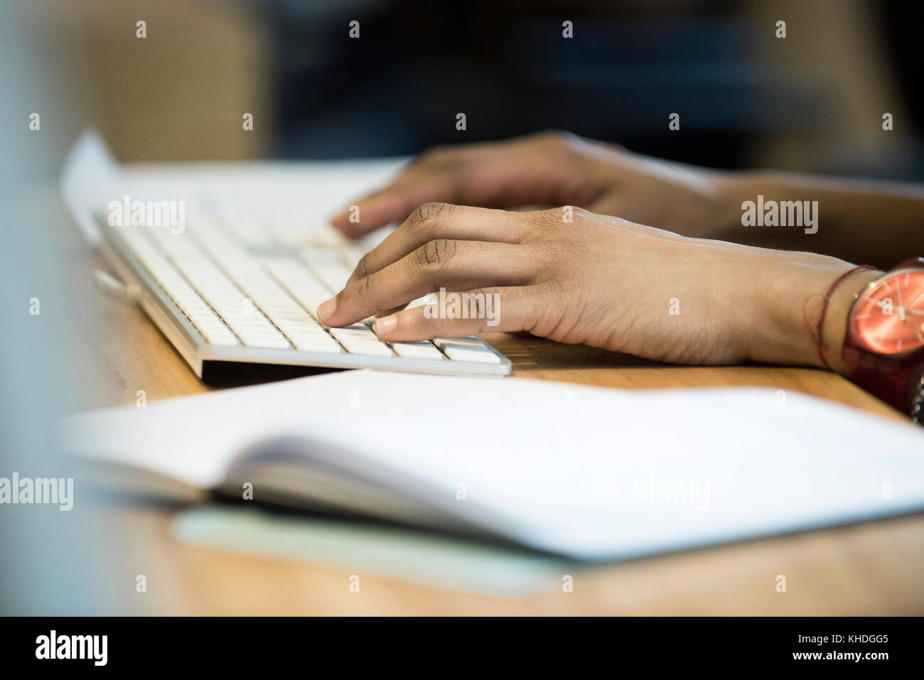 Woman typing on keyboard Stock Photo - Alamy