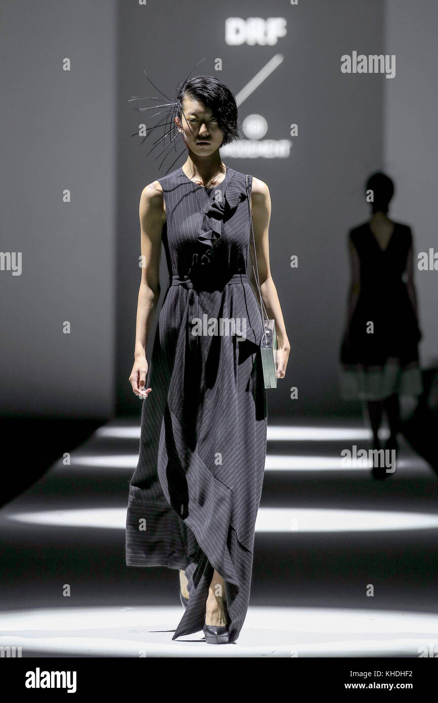 A model on the catwalk at the DRF show during Shanghai Fashion Week ...