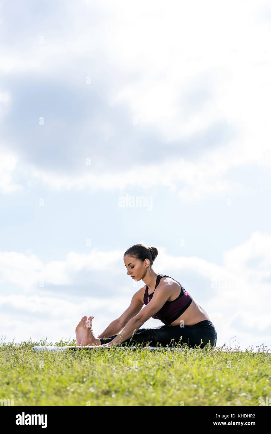 Bending forward hi-res stock photography and images - Alamy