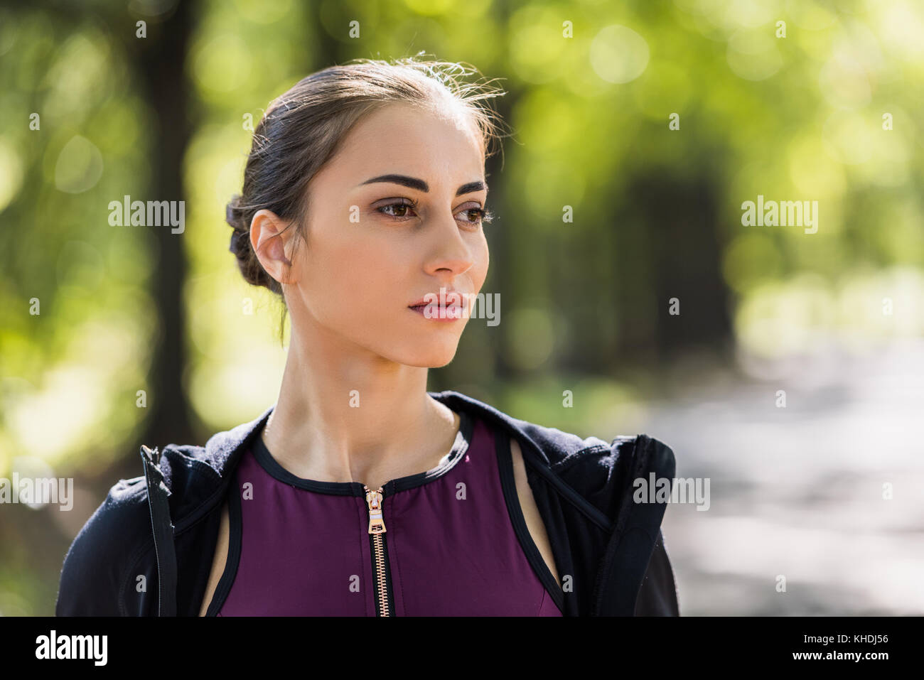 thoughtful woman in park Stock Photo - Alamy