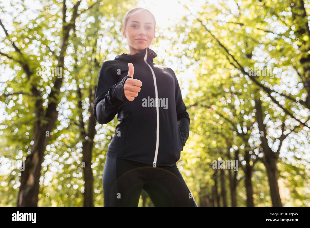 showing thumb up Stock Photo - Alamy