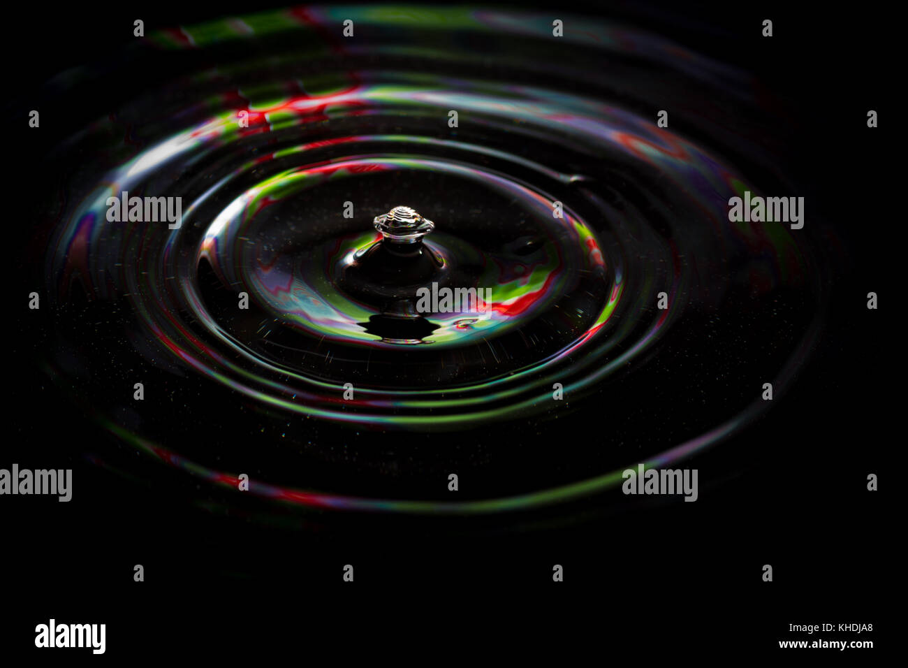 water drop making ripples Stock Photo - Alamy