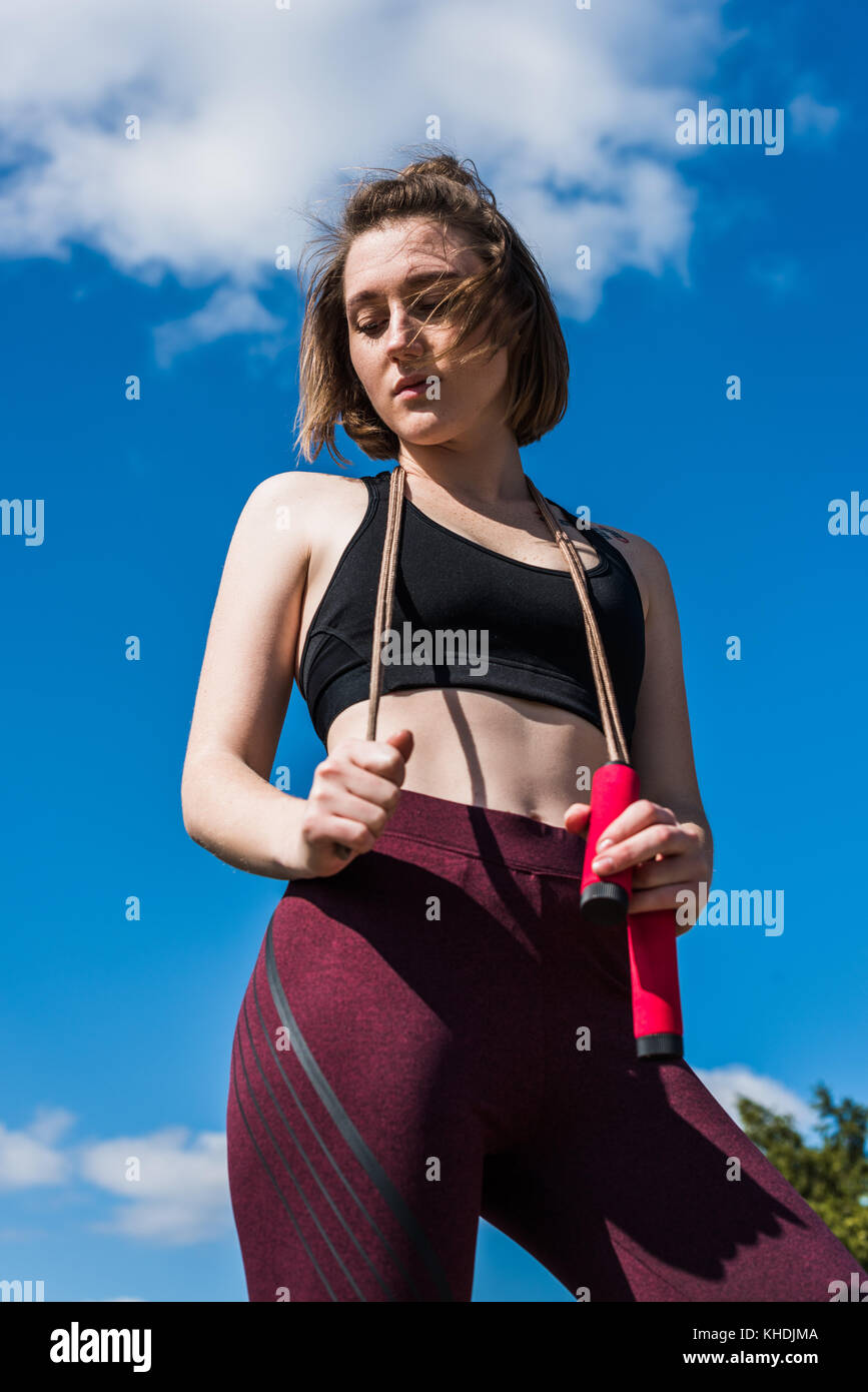 sportive woman with jumping rope Stock Photo - Alamy