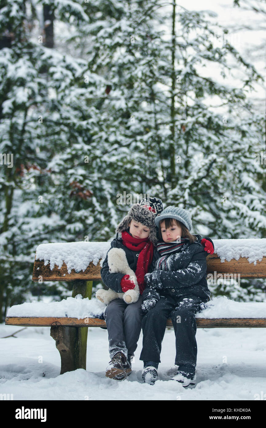 Two Sad Boys Hugging