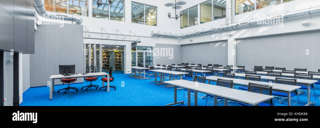Panorama of modern and bright college meeting room in grey and blue ...