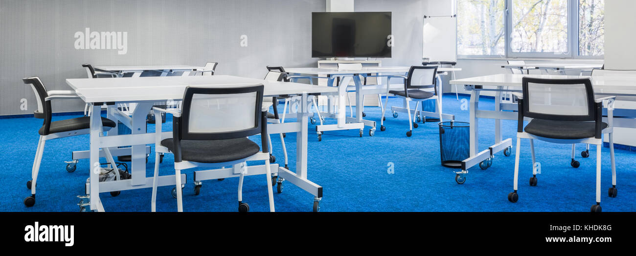 Panorama of modern college group study room in white and blue with ...