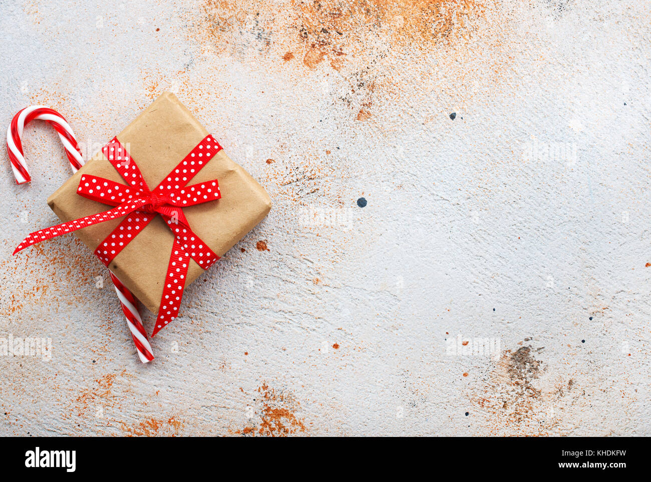 box for present and candy cane on a table Stock Photo - Alamy