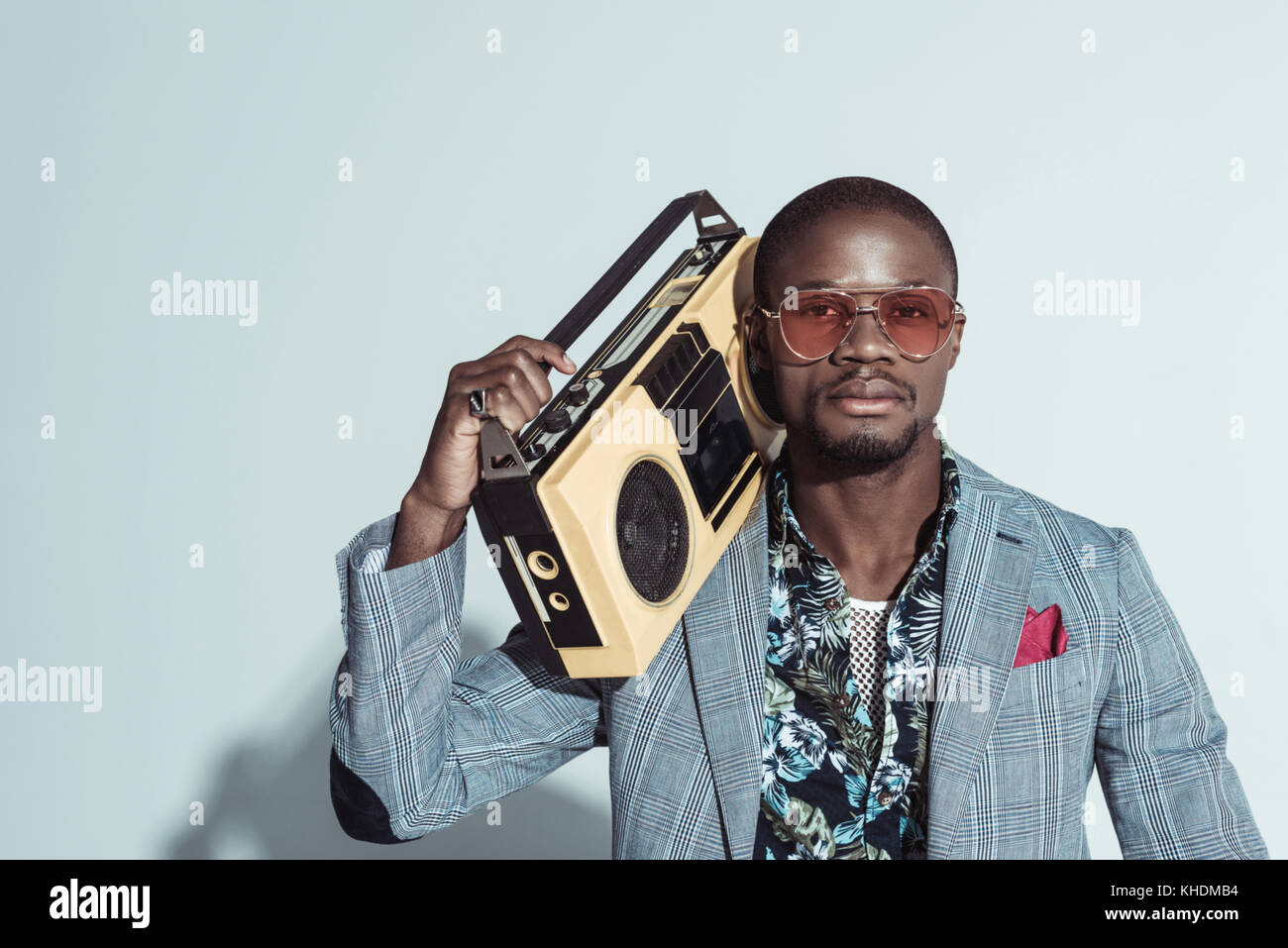 Stylish man with boombox Stock Photo - Alamy