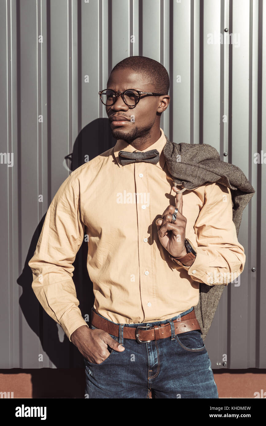 man with jacket on shoulder Stock Photo - Alamy