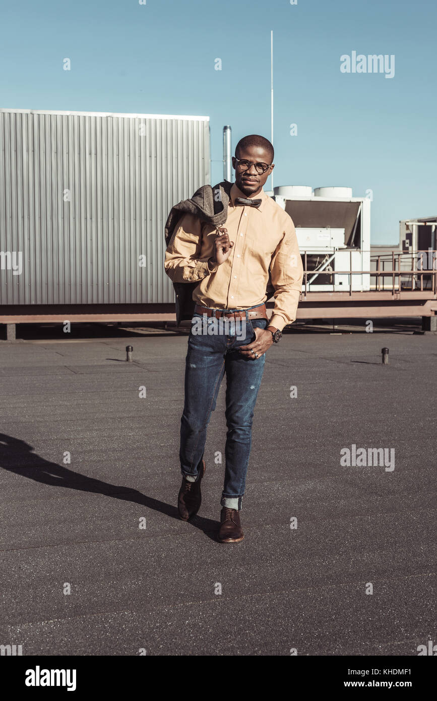 african american man standing on rooftop Stock Photo - Alamy