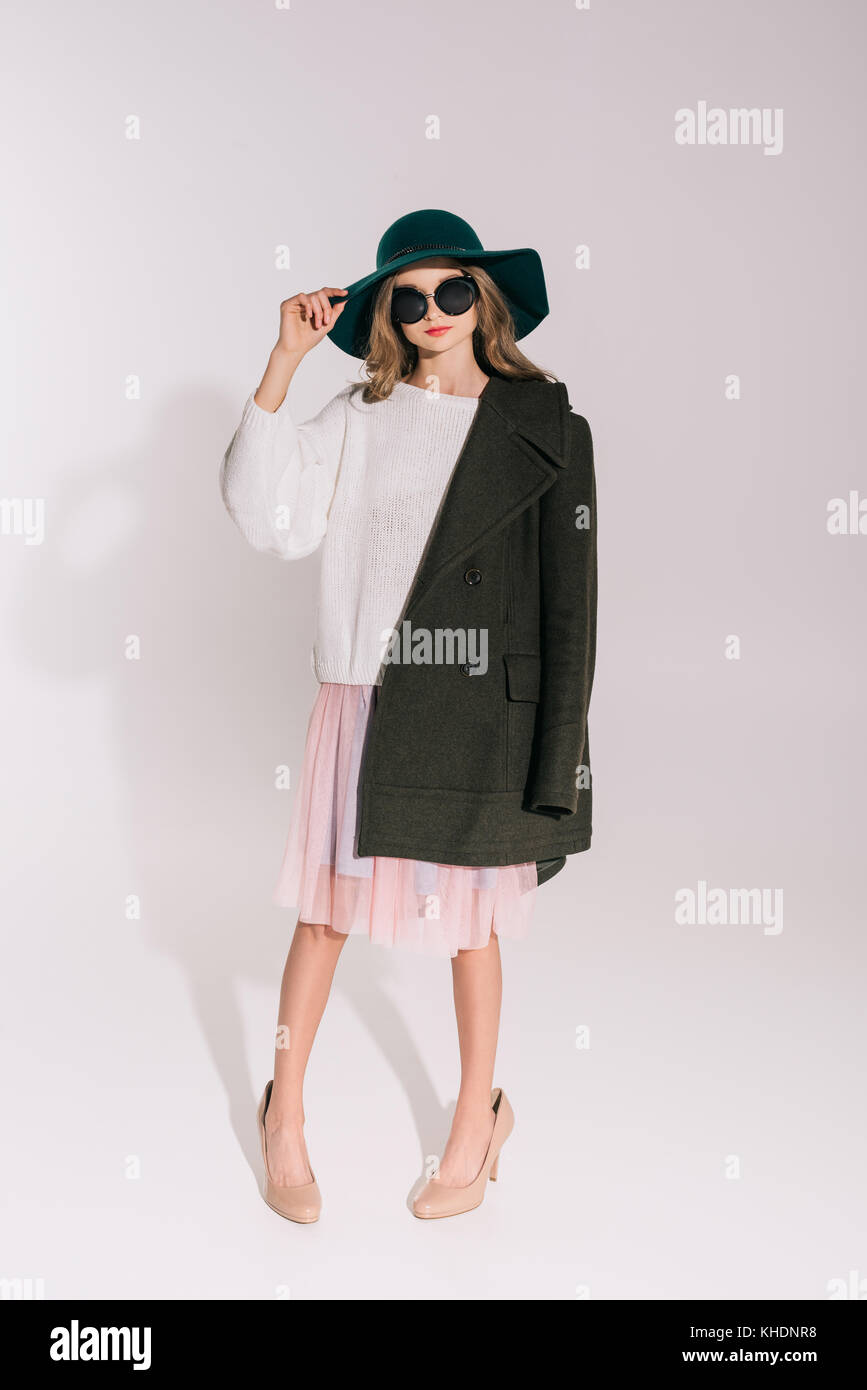 teenage girl in hat and overcoat Stock Photo - Alamy