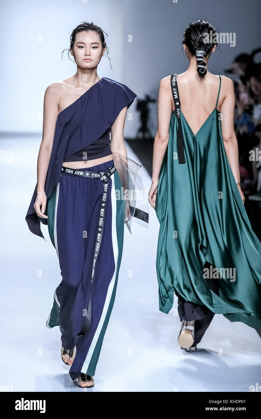 A model on the catwalk at the May Hsu show during Shanghai Fashion Week ...