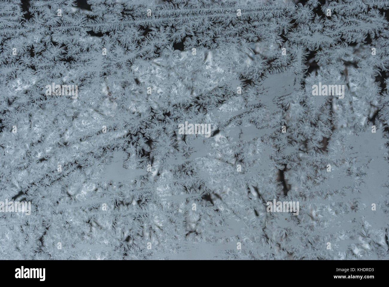 frosty patterns in the window Stock Photo - Alamy