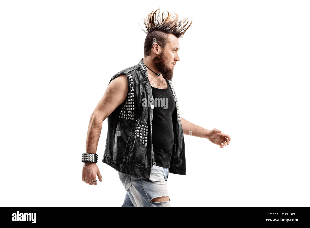 Angry punker walking isolated on white background Stock Photo - Alamy