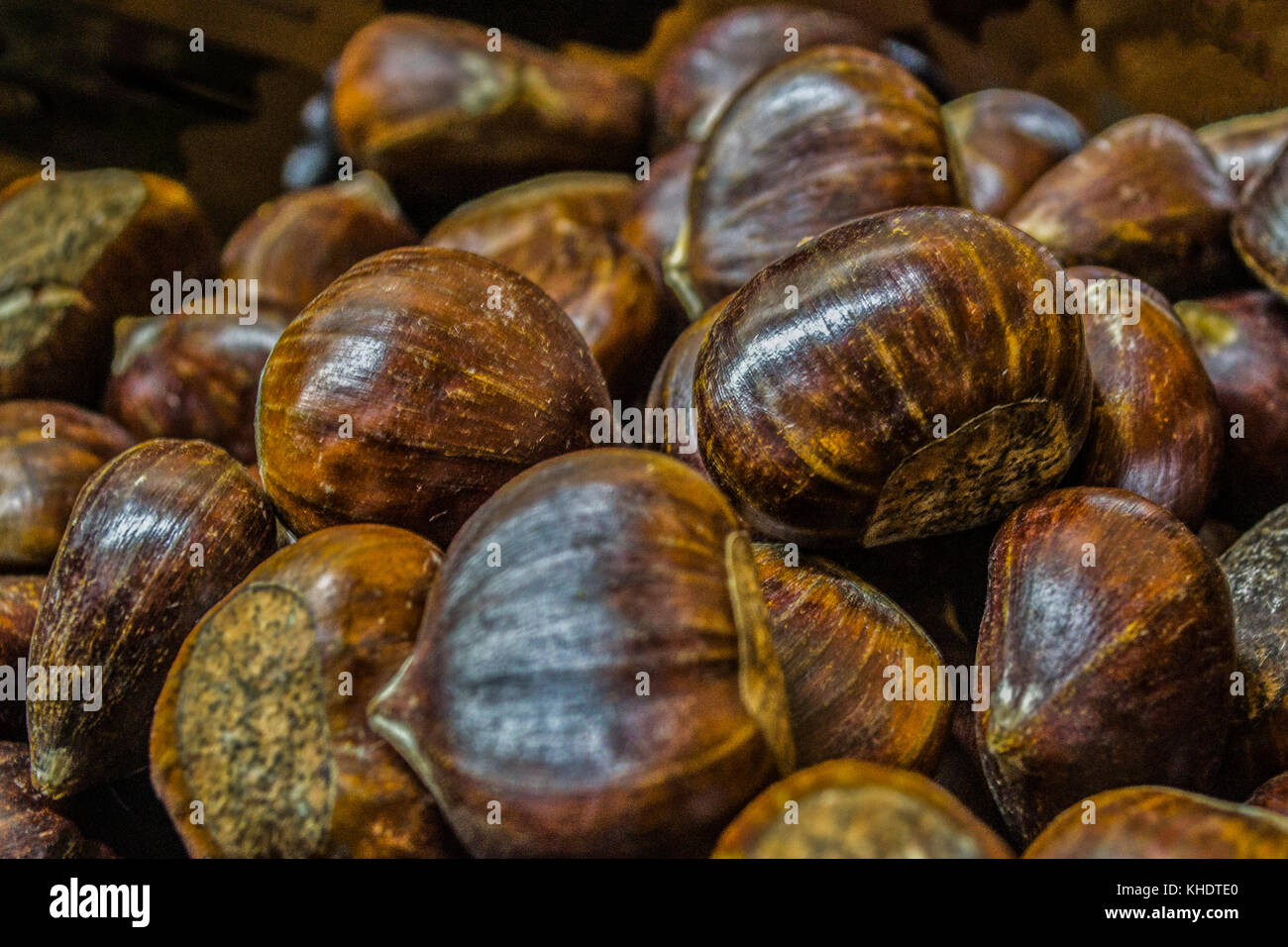 A bowl full of tasty edible chestnuts ready to be roasted Stock Photo ...