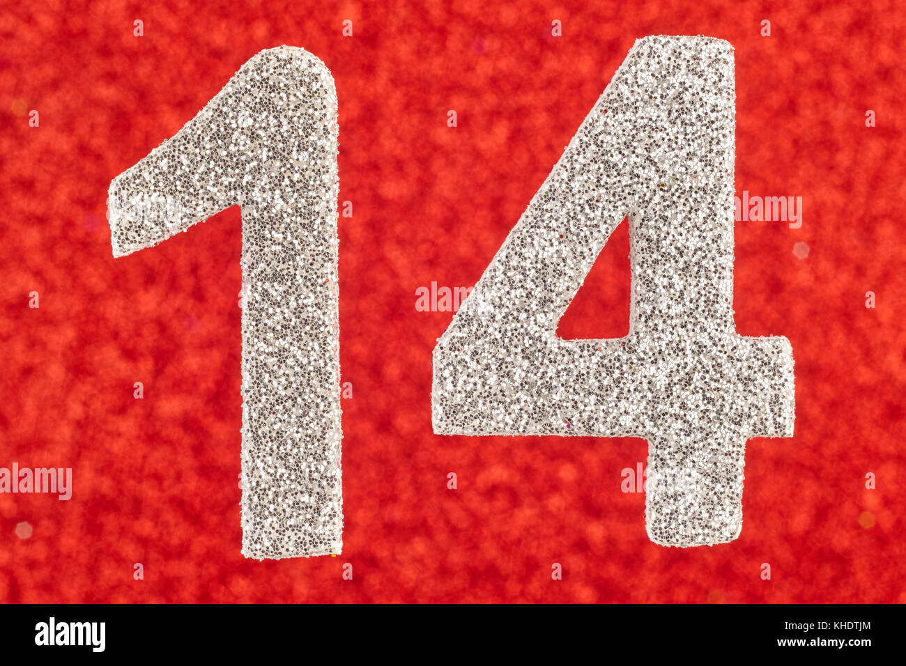 Number fourteen silver color over a red background. Anniversary ...