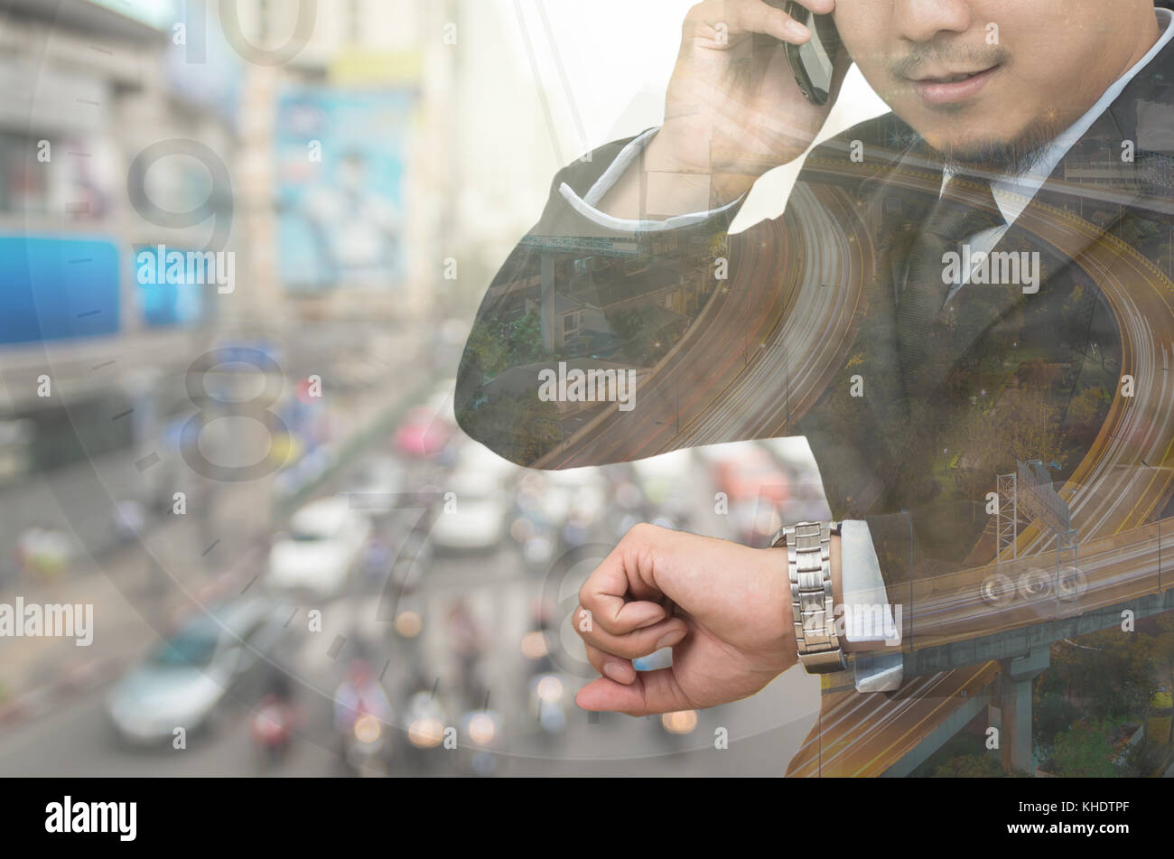 Double exposure of businessman looking his watch and calling phone call ...