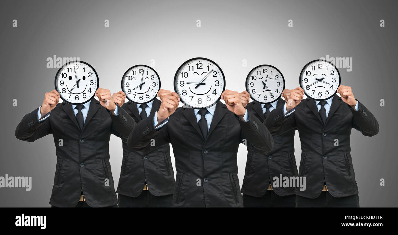 set of 5 picture of Asian businessman holding the clock to close his ...