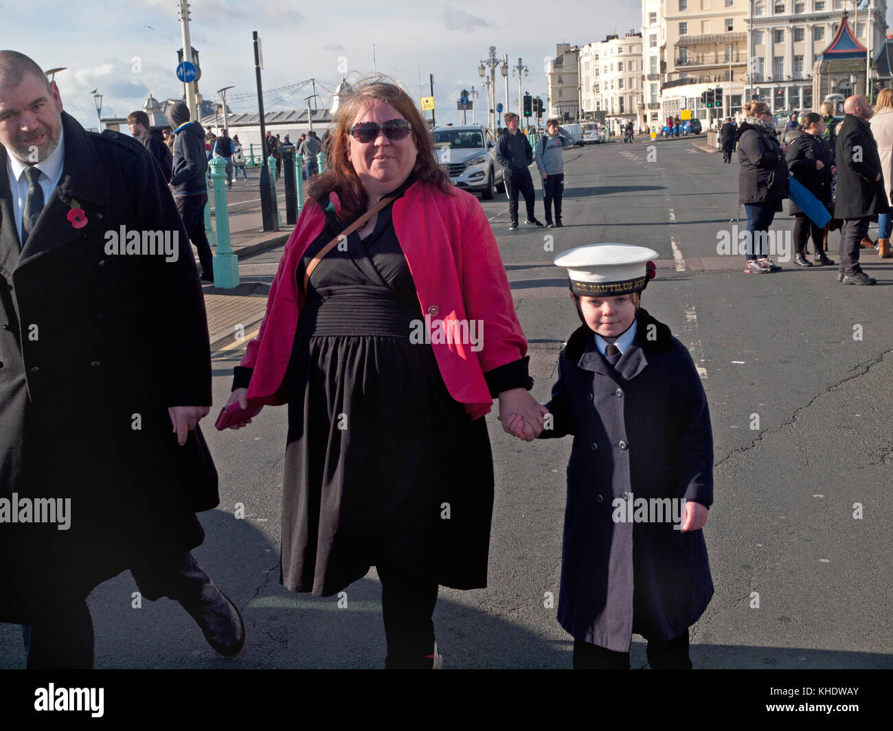 A young sea cadet with her family at the Remembrance Day parade on ...