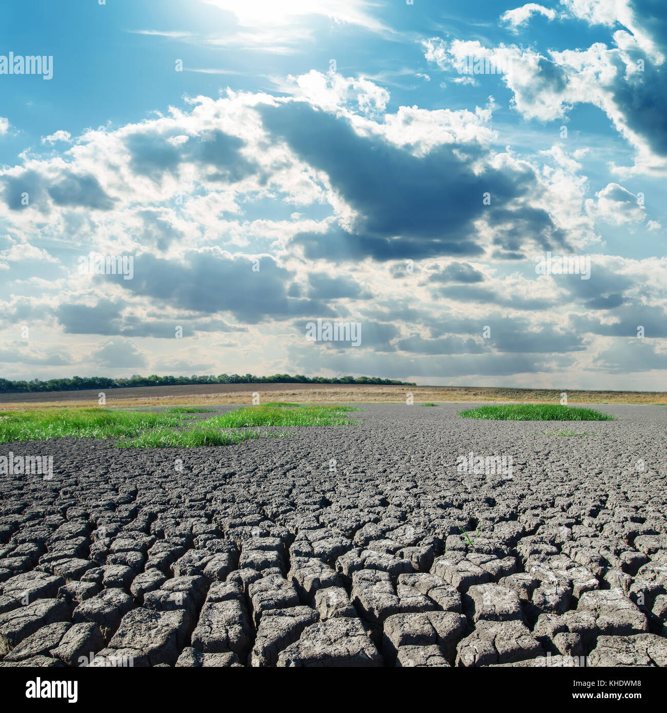 drought earth under dramatic sky Stock Photo - Alamy