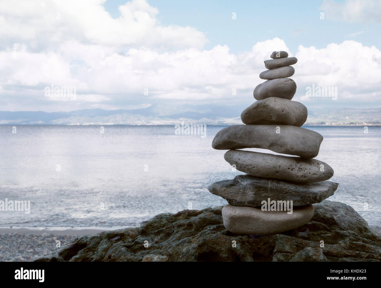 stack of zen stones on beach with copy space Stock Photo - Alamy