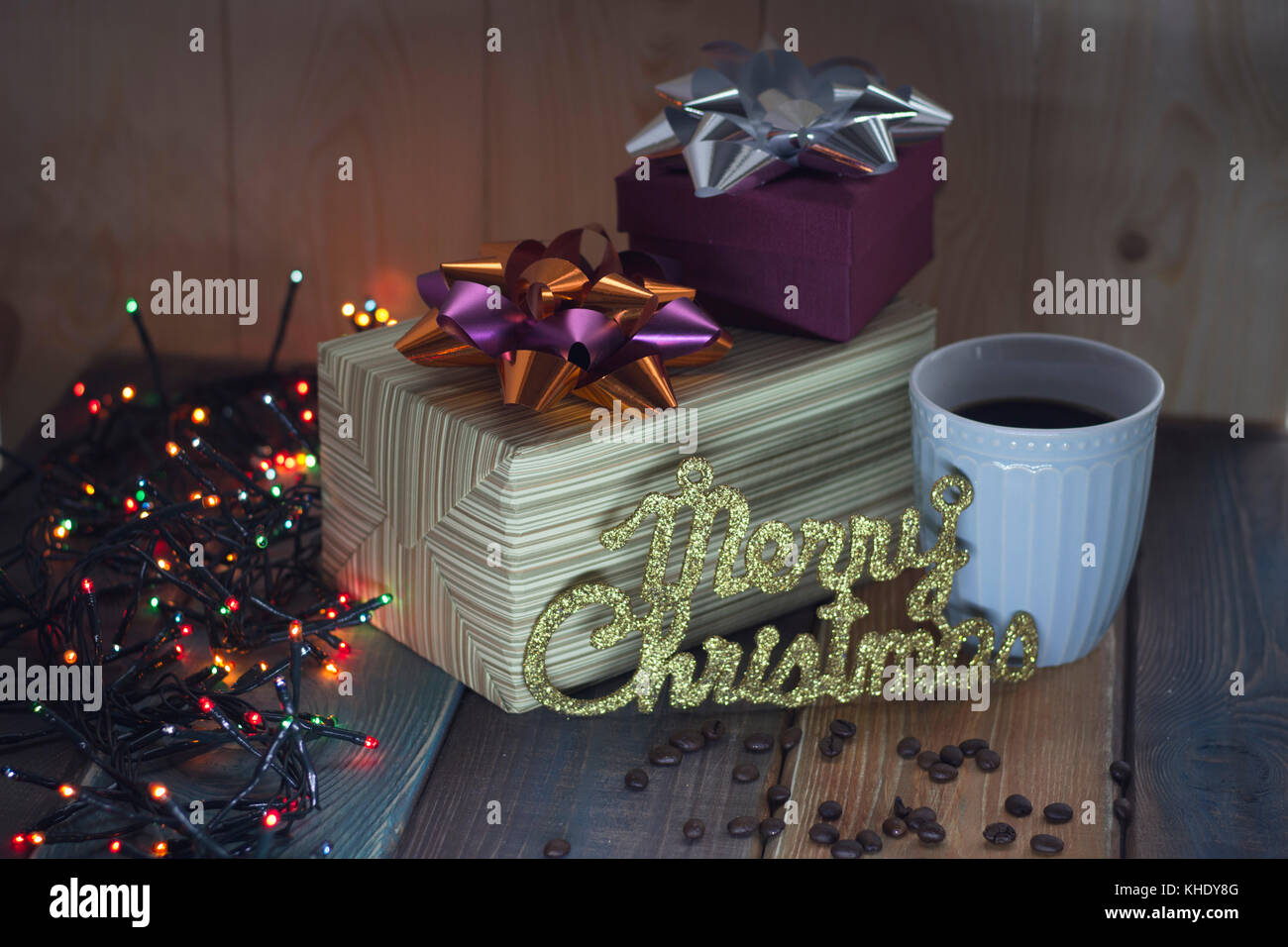 Two gift boxes, inscription Marry Christmas, a cup of coffee Stock ...
