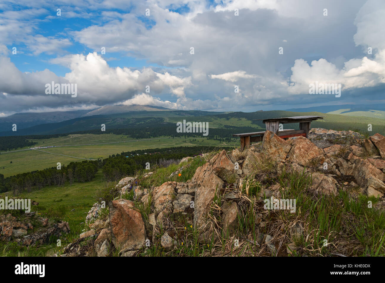 Scenic top view on the valley, forest and mountains on the background ...