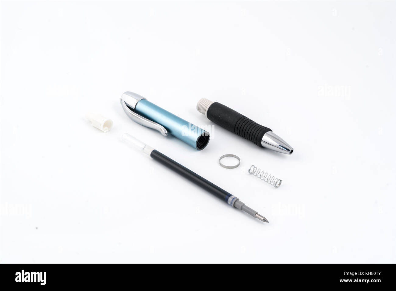 a ballpoint pen disassembled on a white background Stock Photo - Alamy
