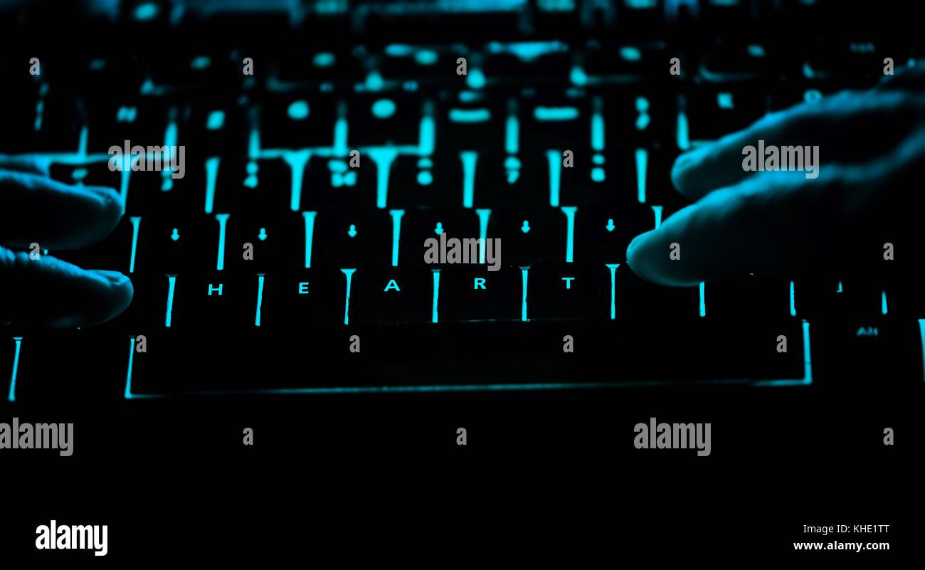 Heart - text on illuminated computer keyboard at night. Internet search ...