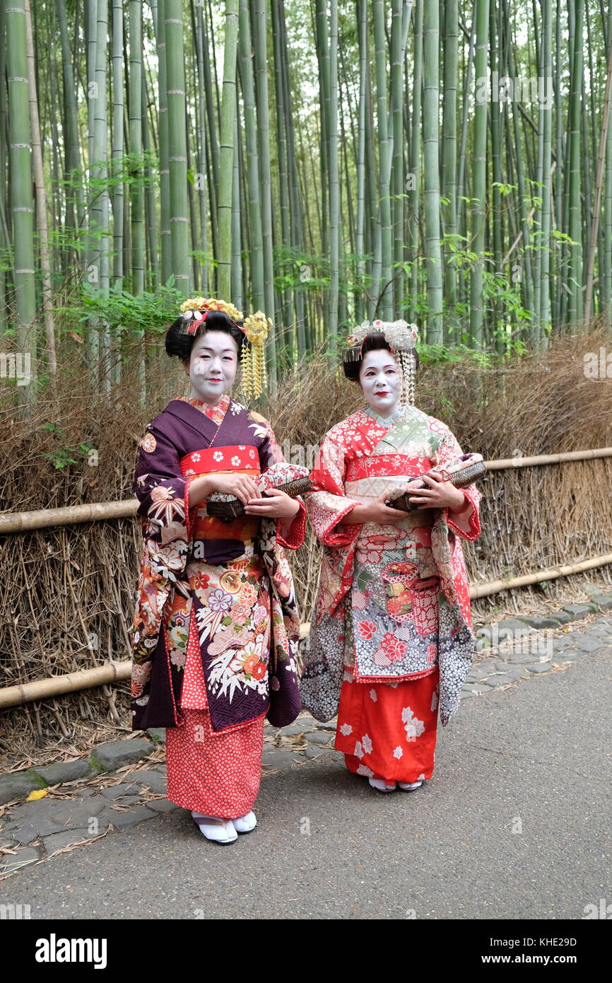 Two traditional geisha's in the Bamboo Forest in Kyoto, Japan Stock ...
