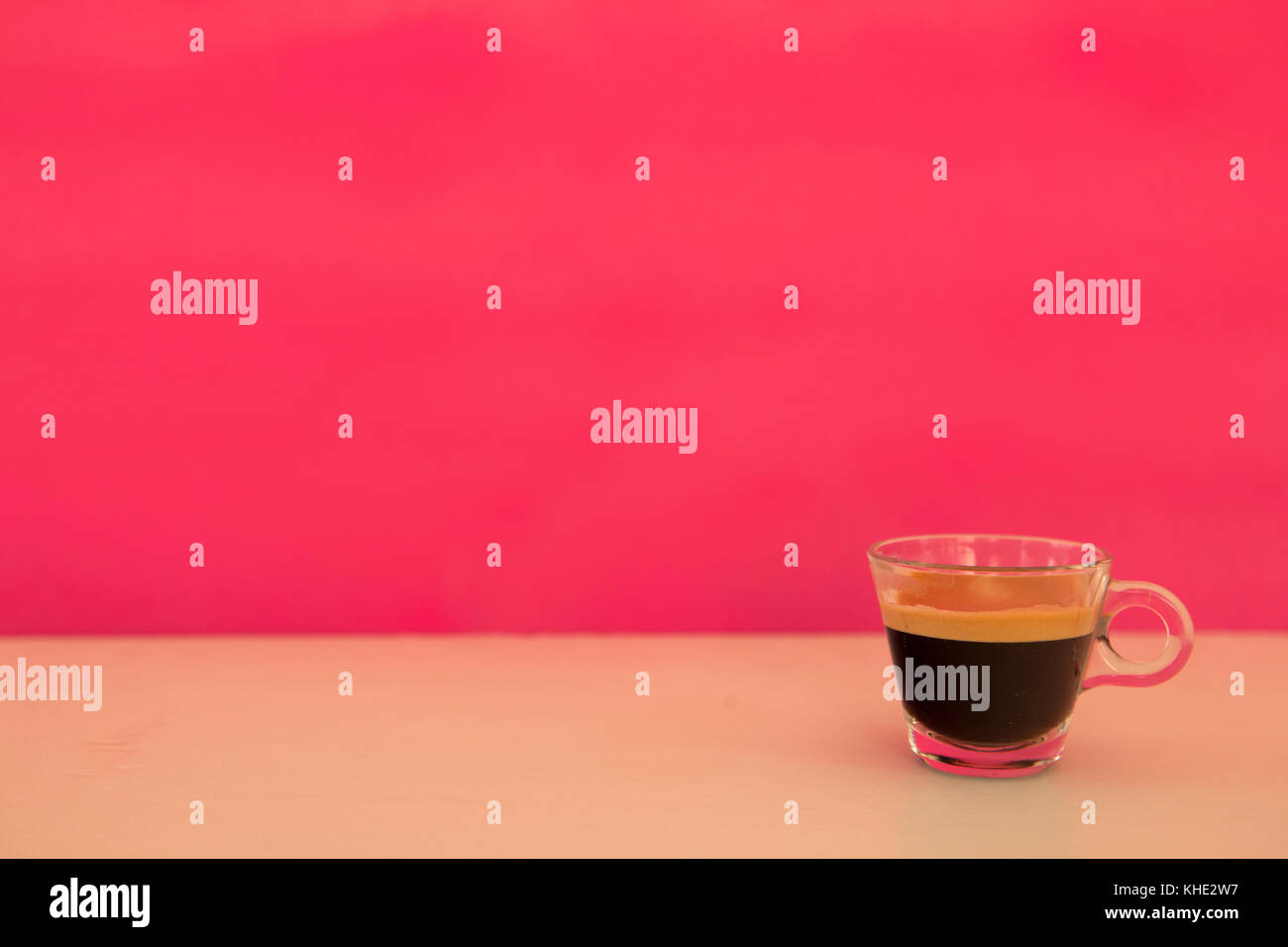 Cup of espresso coffee, pink background Stock Photo - Alamy