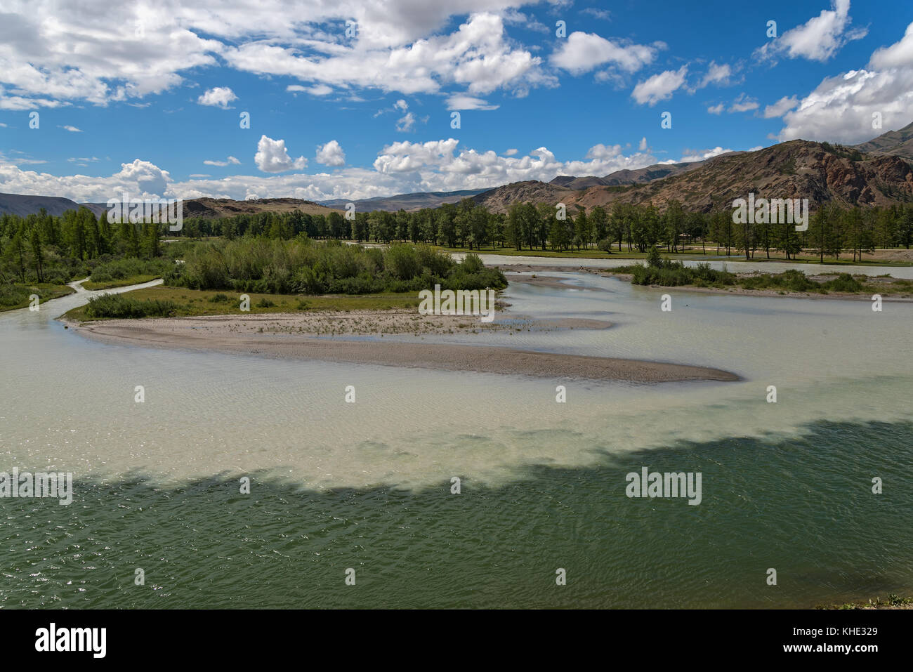 The picturesque view of the mountains, the forest and the merger of two ...