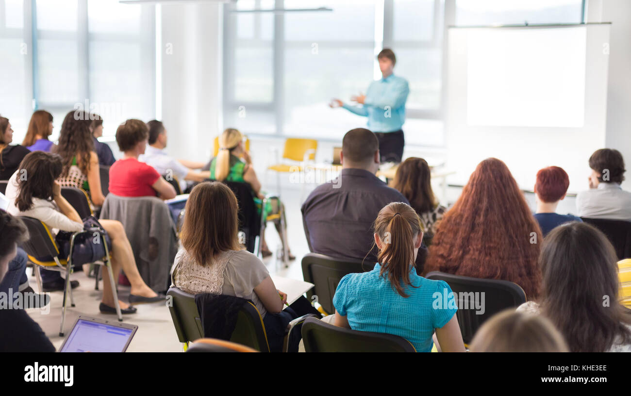 Speaker giving presentation on business conference Stock Photo - Alamy