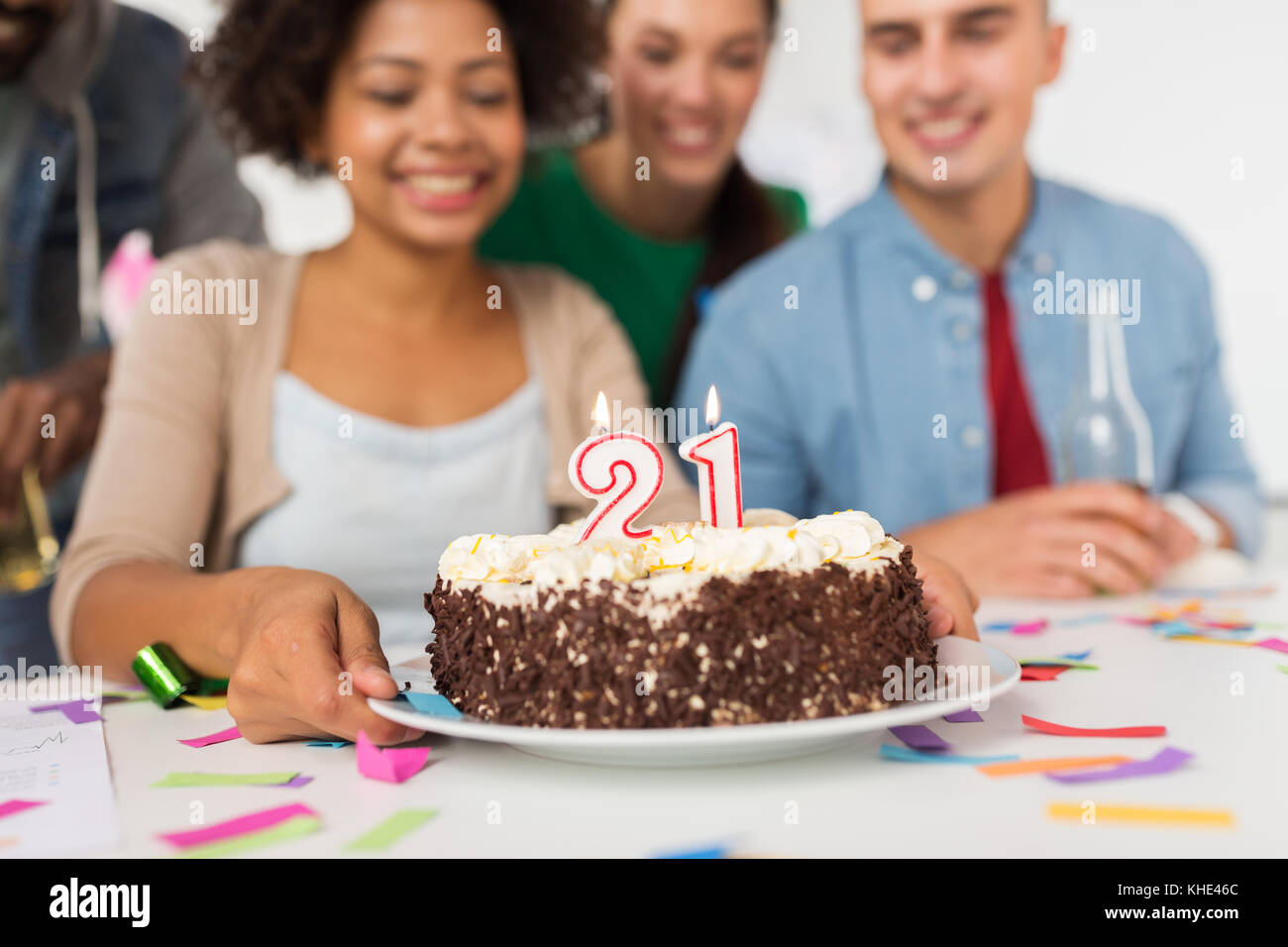 team greeting coworker at office birthday party Stock Photo - Alamy